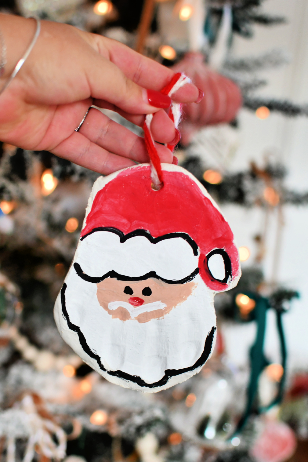 The Easiest DIY Santa Ornaments Using Handprints & Air-Dry Clay