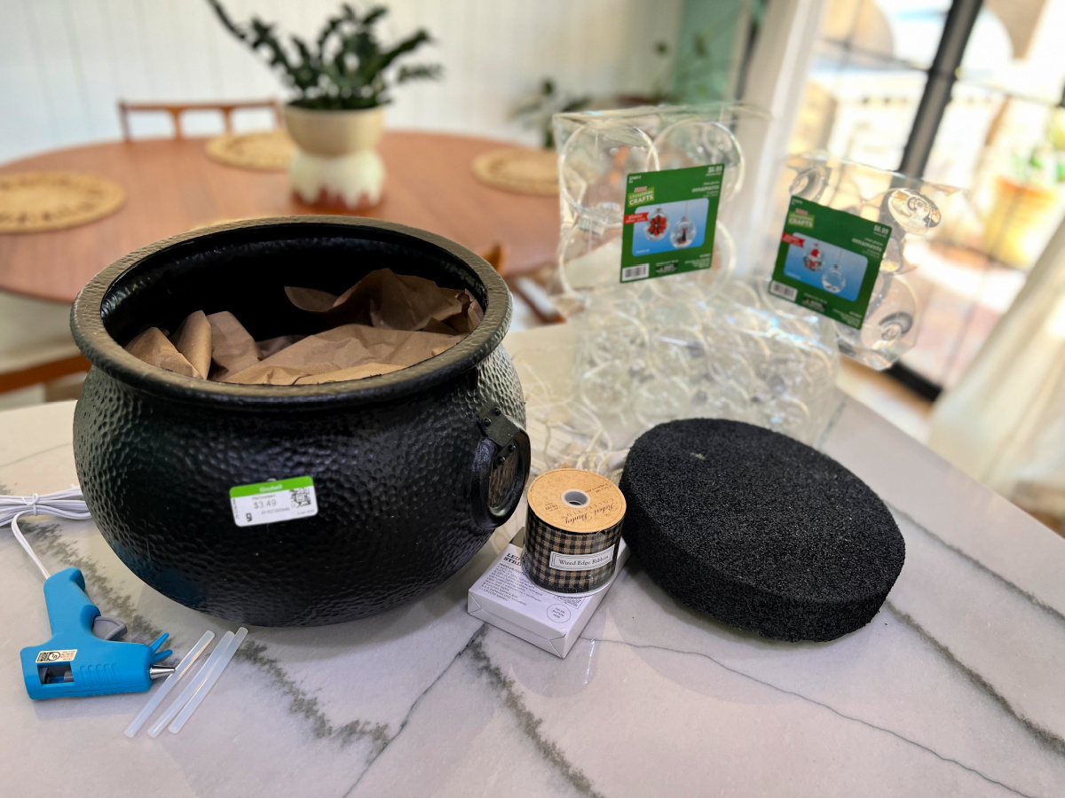 Create a DIY Halloween Witches Cauldron Using Clear Ornaments!